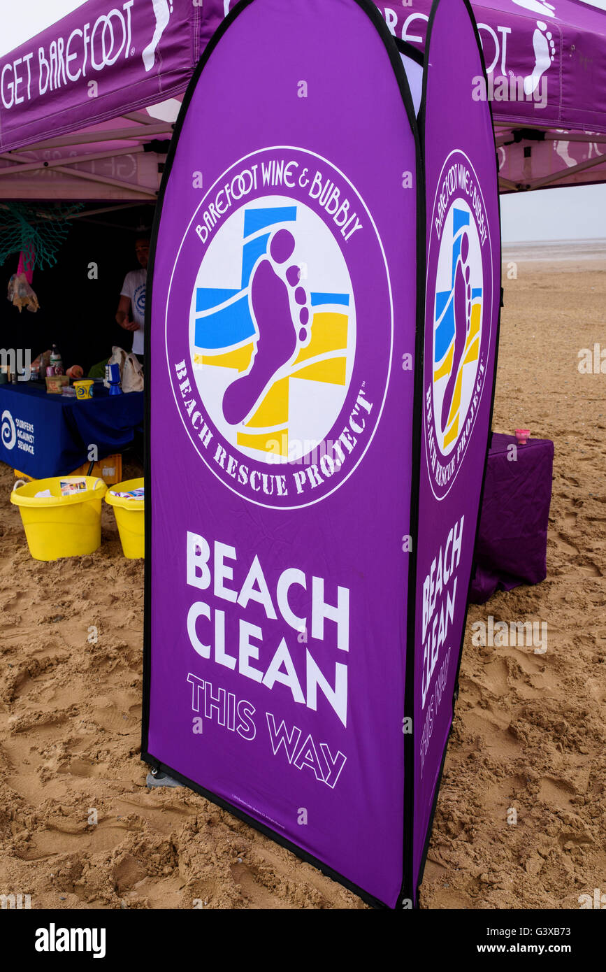 Sign stating "Beach Clean This Way" on a sandy beach in Lytham St Anne ...