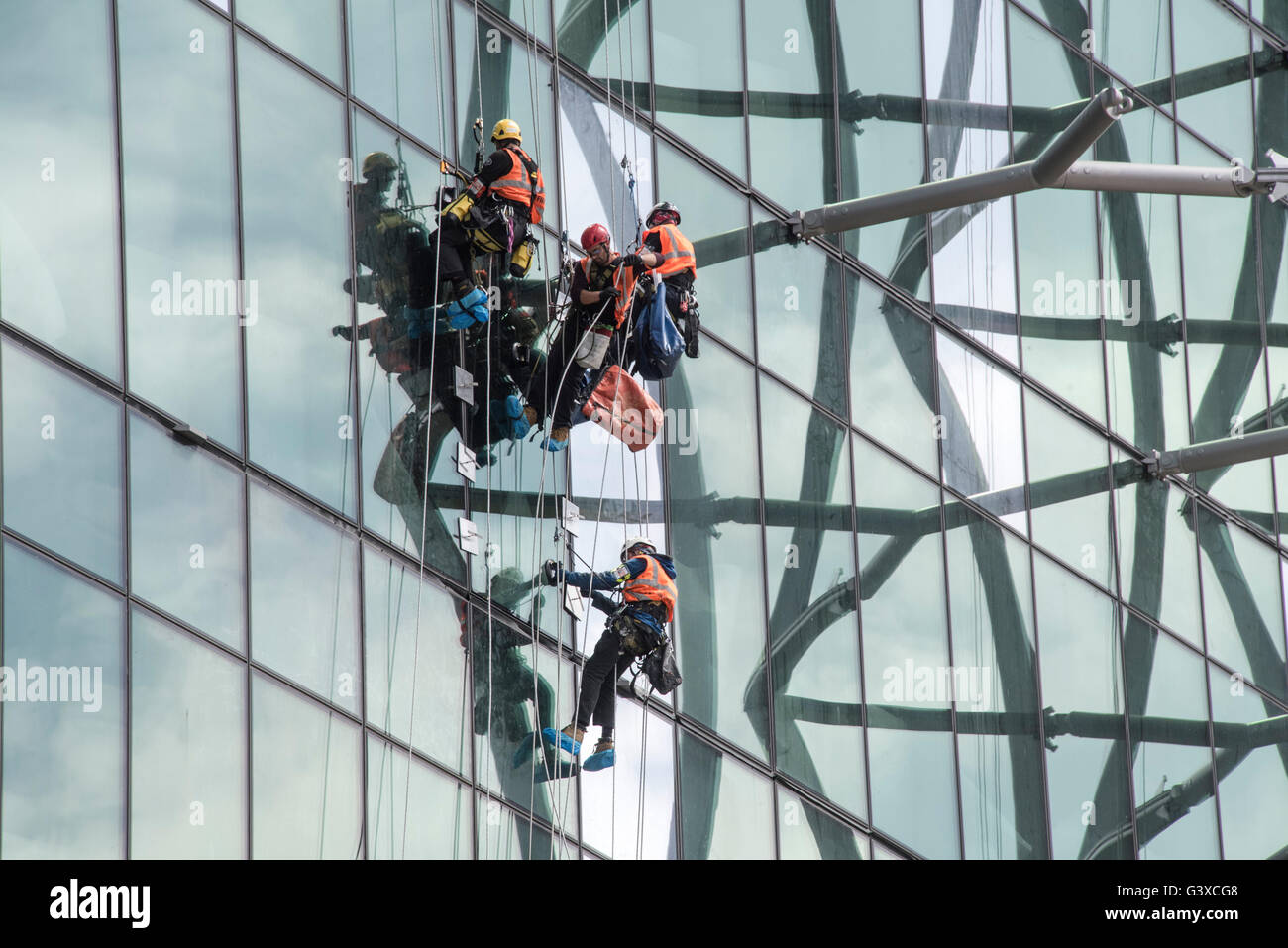 Men at Work US Embassy London Stock Photo - Alamy