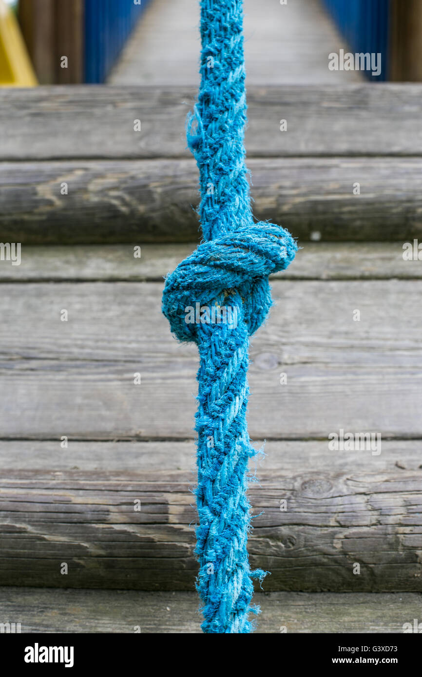 Blue Rope knot at playground Stock Photo - Alamy