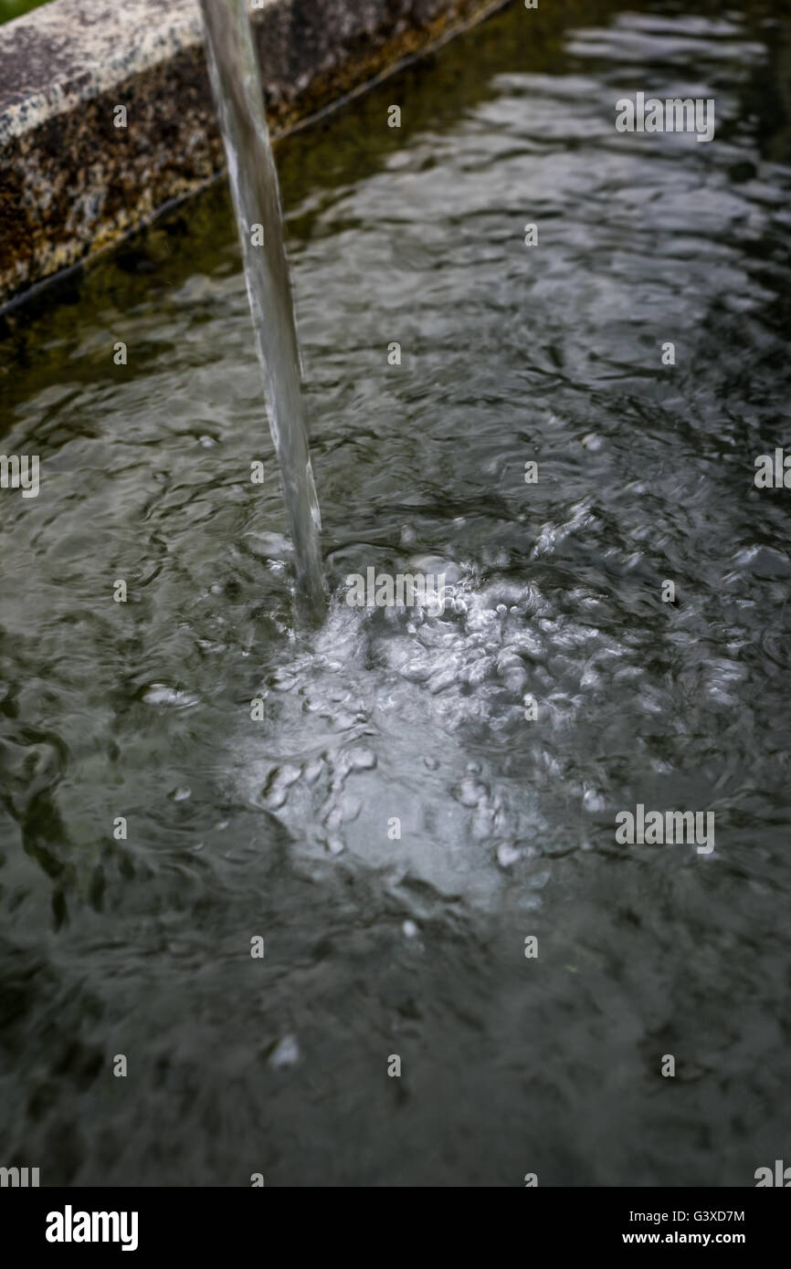 Splashed water drops in stone hi-res stock photography and images - Alamy