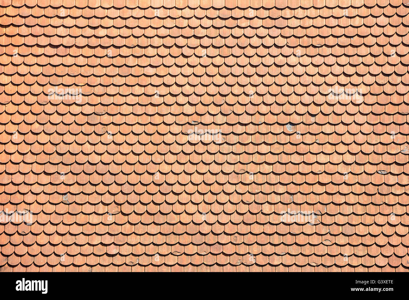 Old tiles roof as texture background Stock Photo - Alamy
