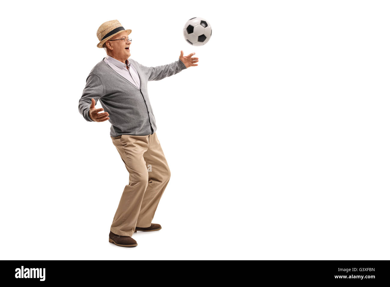 Old man playing football hi-res stock photography and images - Alamy