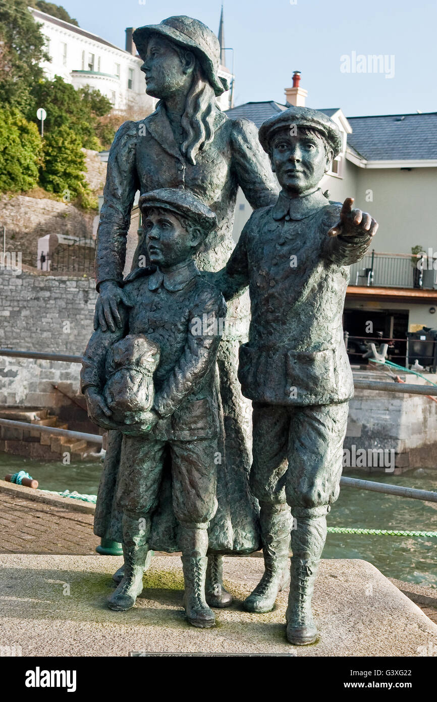 Annie Moore statue at Cobh Passenger Terminal, Ireland. Annie was the ...