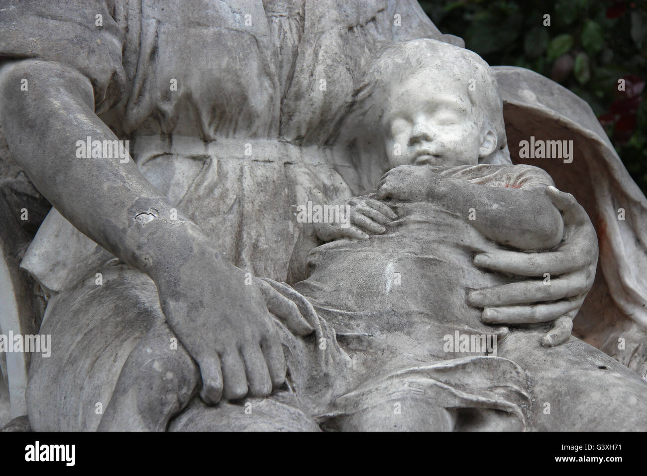 Detail of a statue of a mother and her child in Lille (France Stock ...