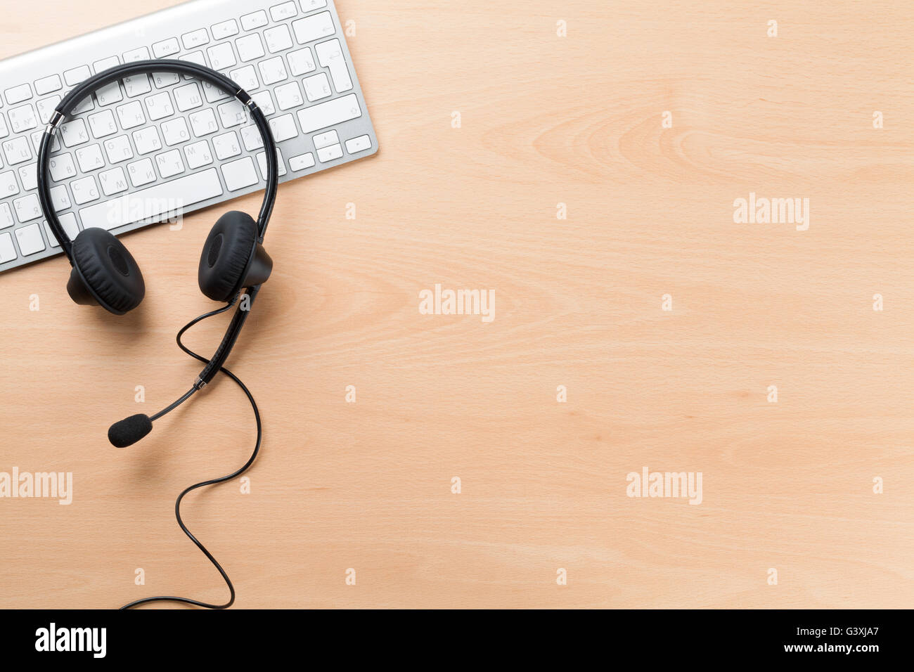 Office desk with headset. Call center support table. Top veiw with copy ...