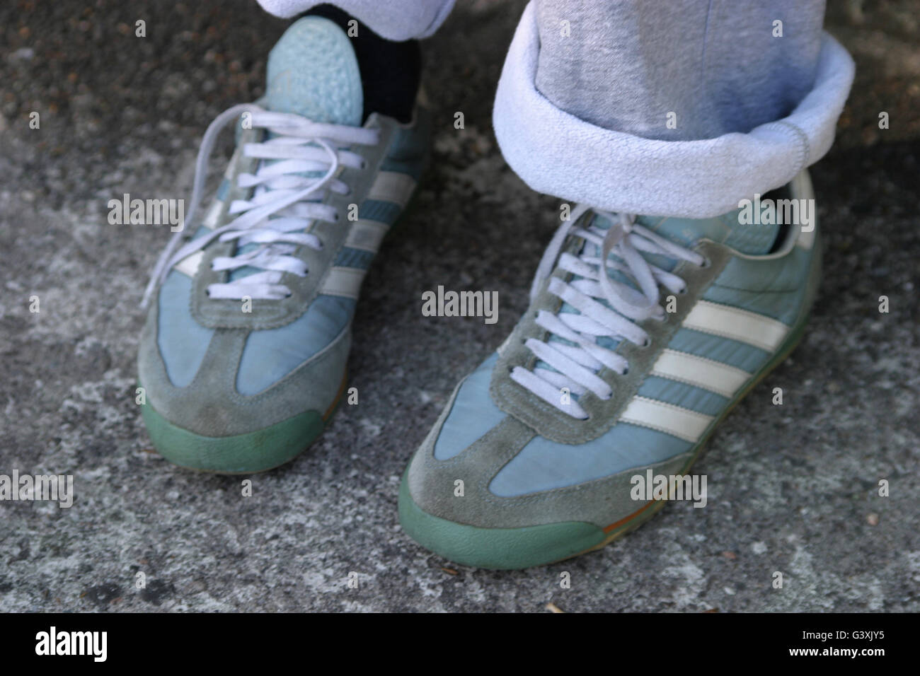 light blue trainers, sneakers Stock Photo - Alamy