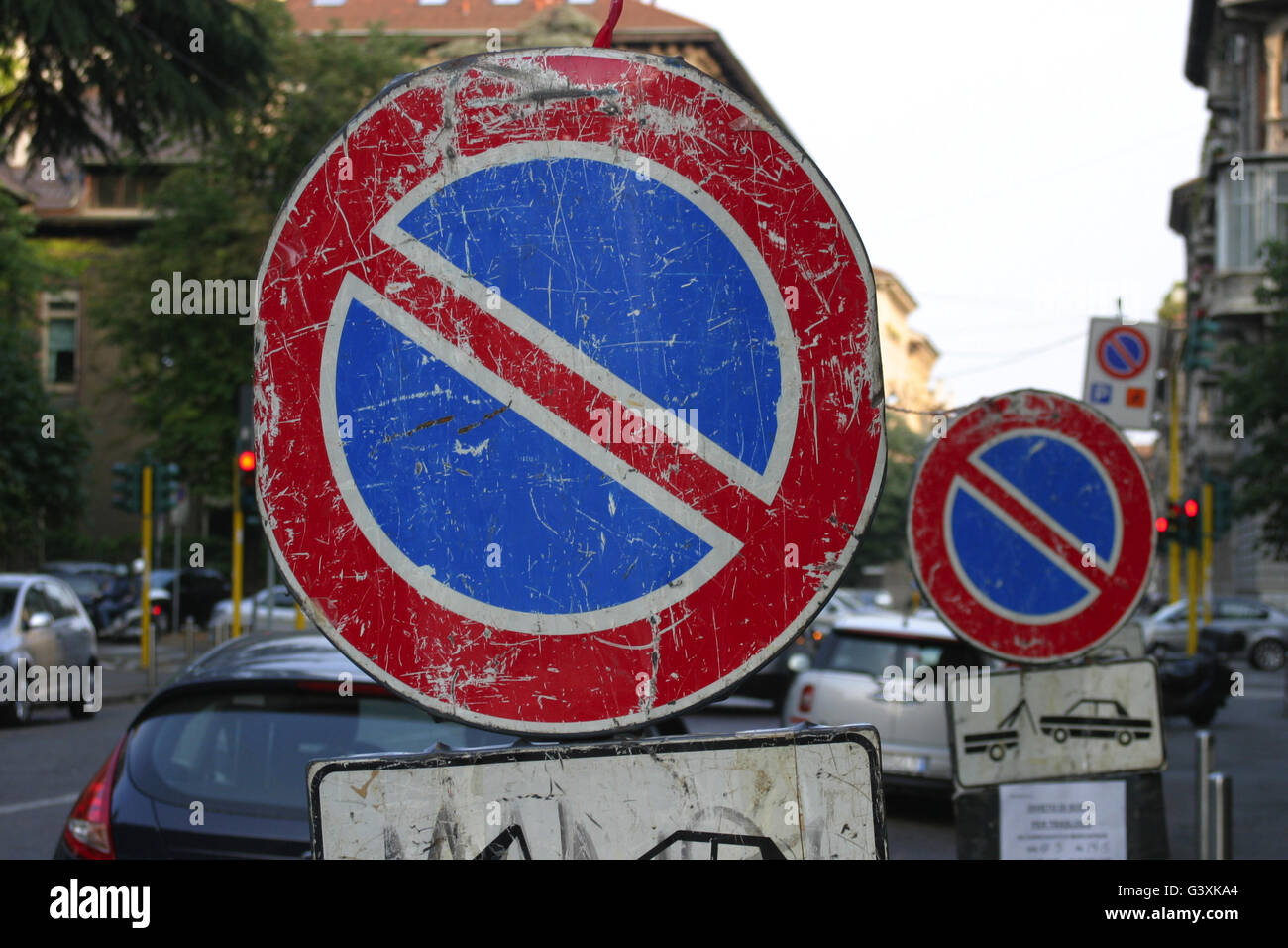 distressed no parking signs, milan, Italy Stock Photo - Alamy