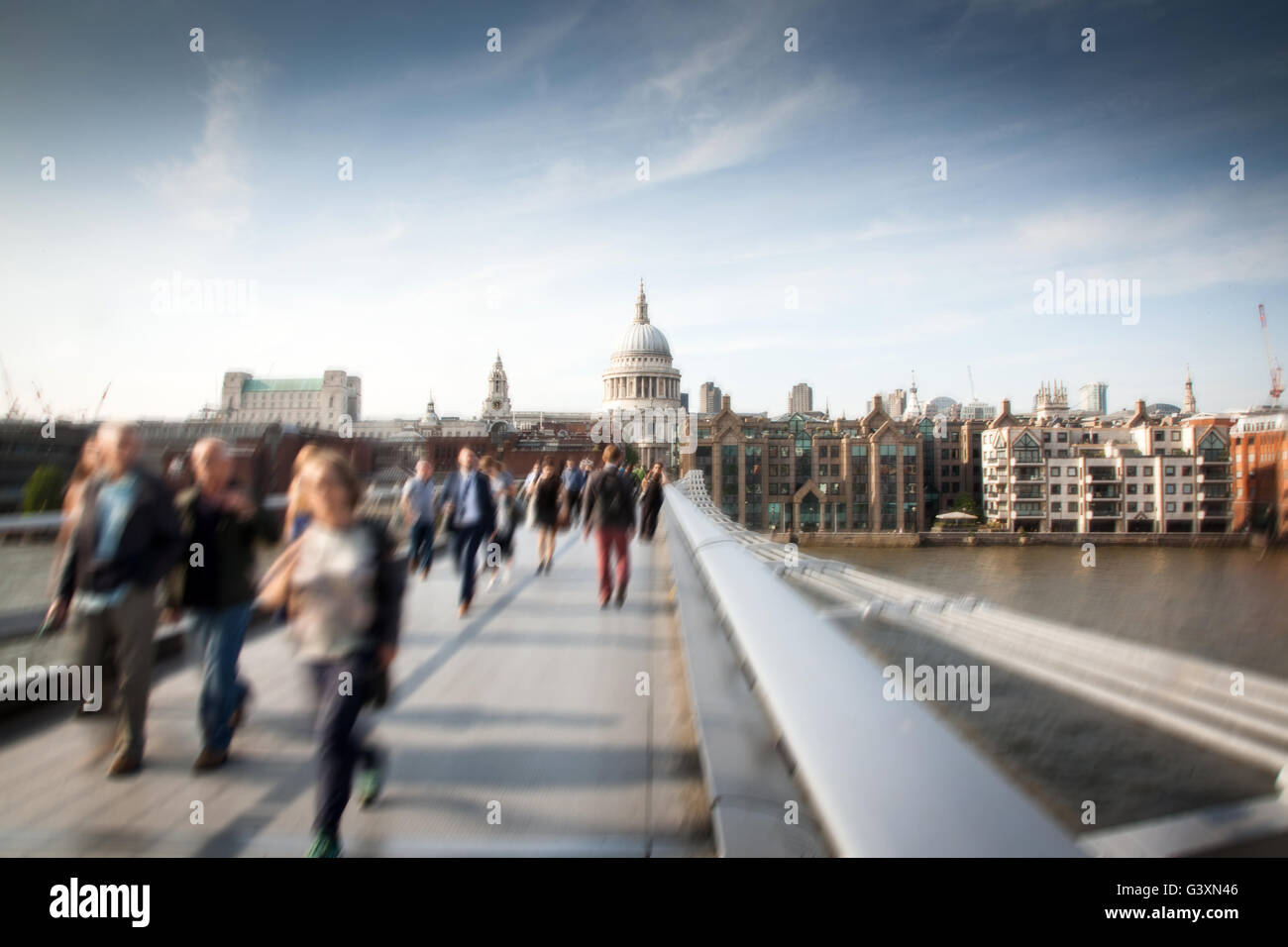 Blurred background of crowd of people on Millennium bridge, St Pauls ...