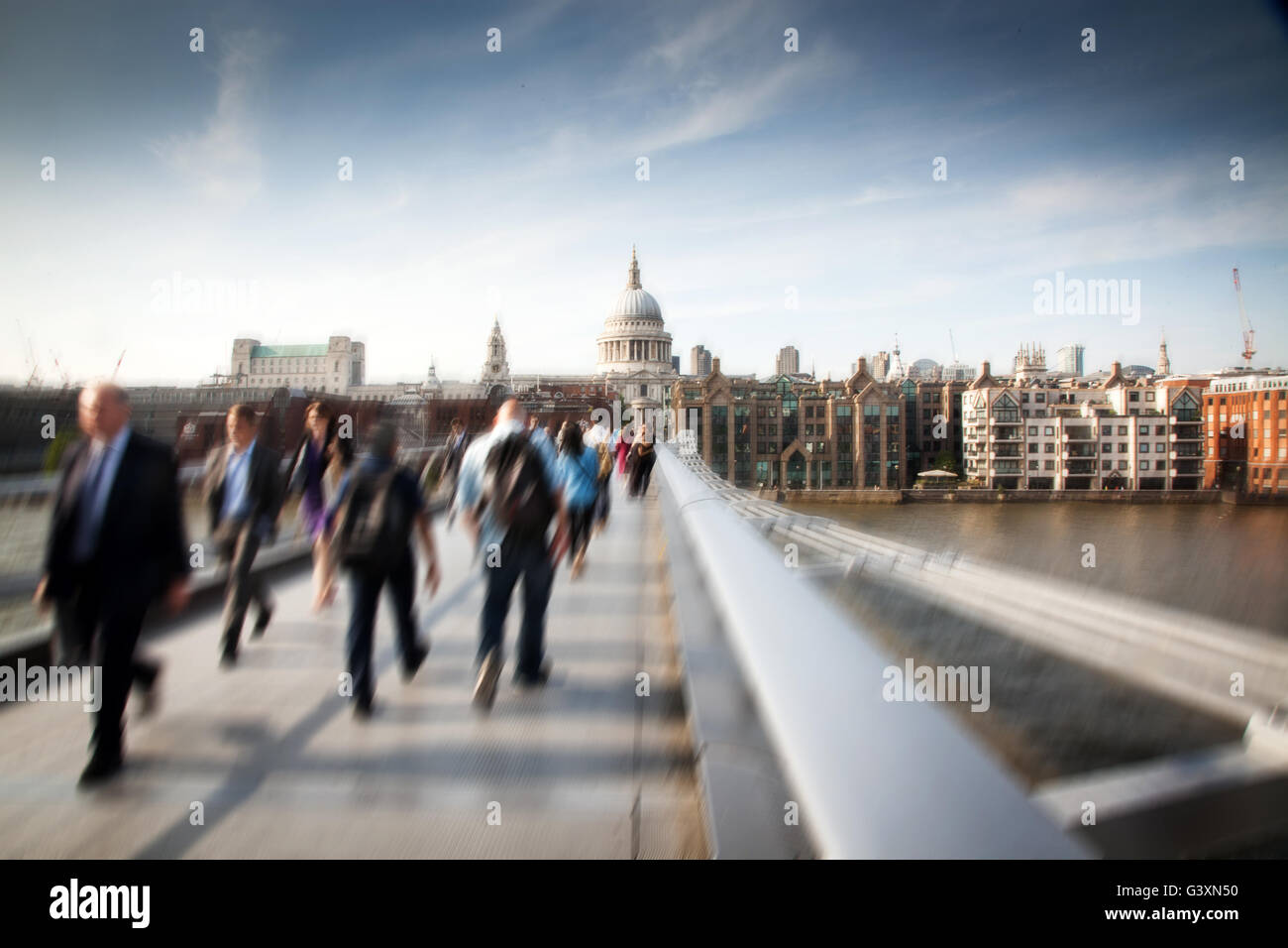 Blurred background of crowd of people on Millennium bridge, St Pauls ...