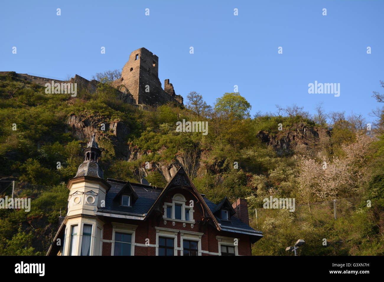 castle with old house, view from the valley Stock Photo - Alamy