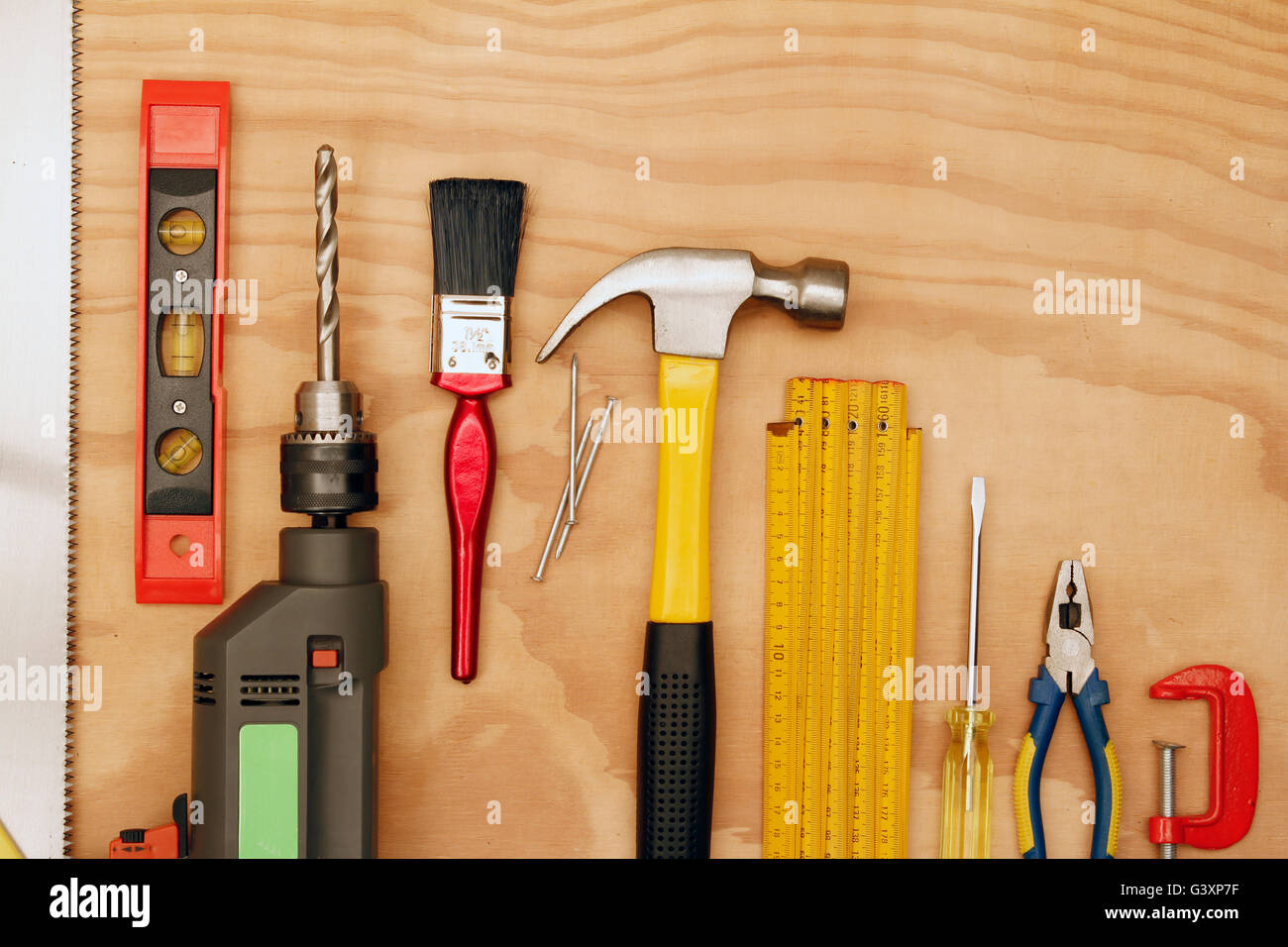 Assorted work tools on wood Stock Photo - Alamy