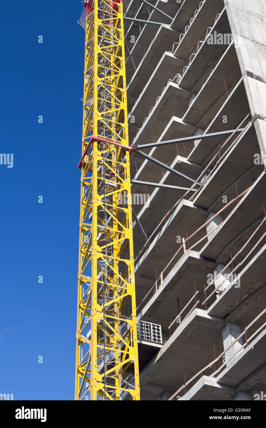 New building construction. Cranes on a construction site Stock Photo ...