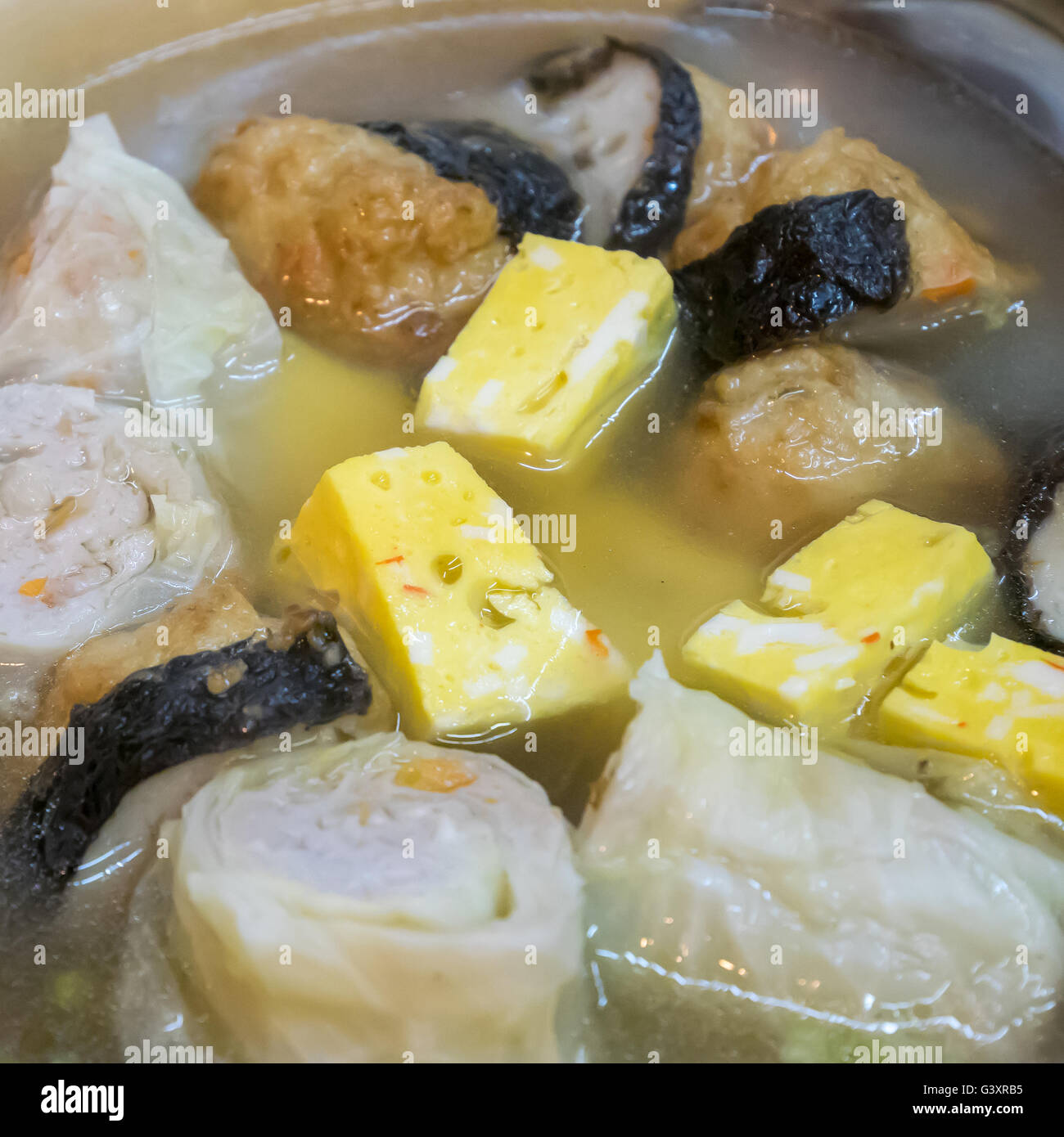 The close up of Taiwanese oden meat balls in soup at food street night ...