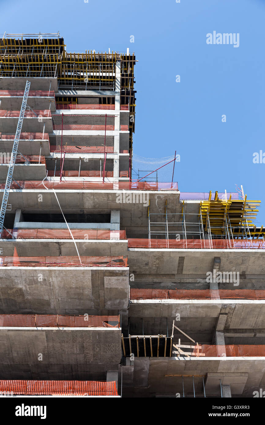 High rise construction site with a concrete structure in the process of ...