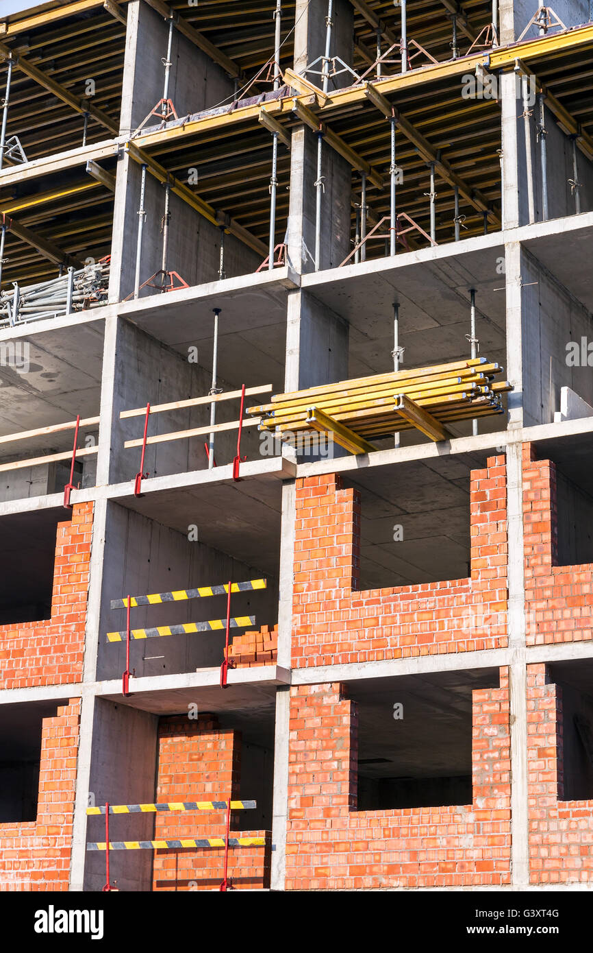 High-rise construction site with a concrete structure in the process of ...