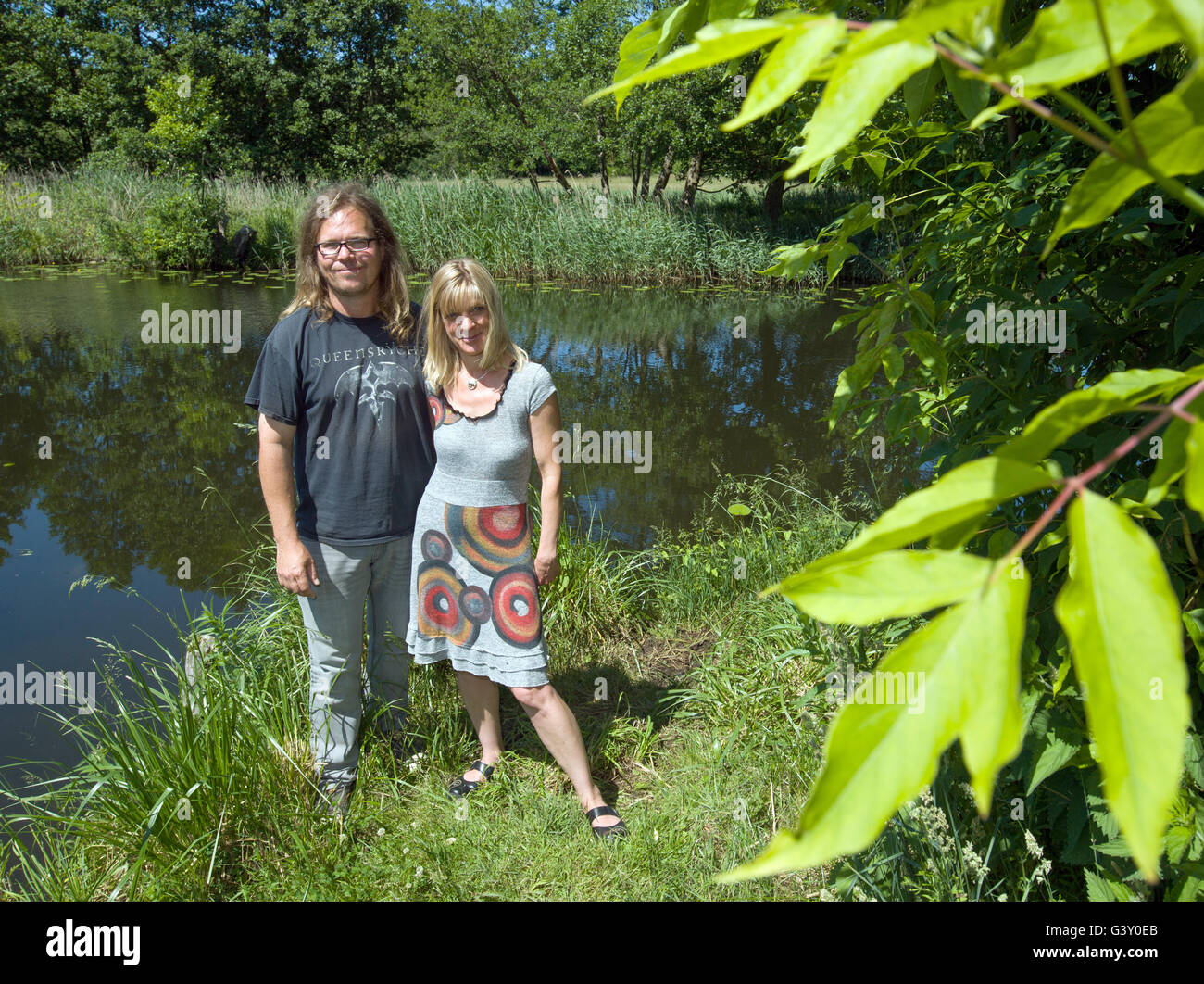 Steffi and Sven Heussen stand on the premises of their guesthouse ...