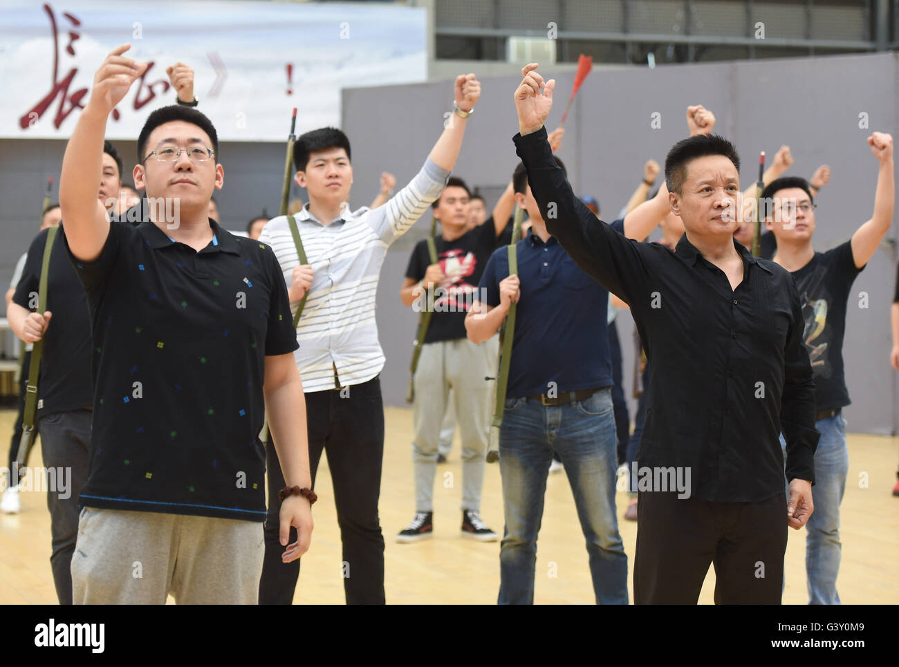 Taiyuan, China. 16th June, 2016. Singer Yan Weiwen (R front) and other ...