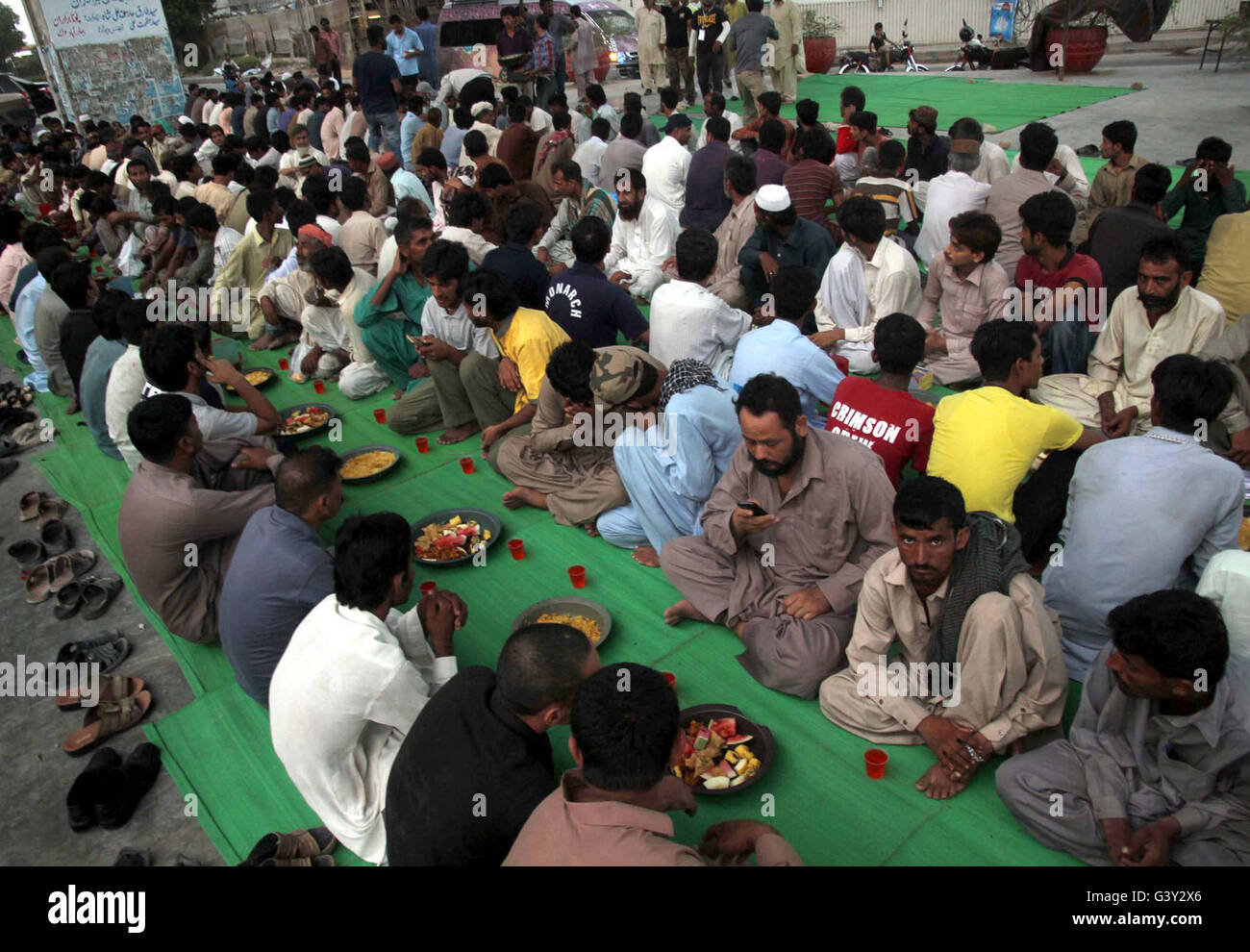 Muslims are breaking their Fast on the eve on 10th of Ramzan-ul-Mubarak ...
