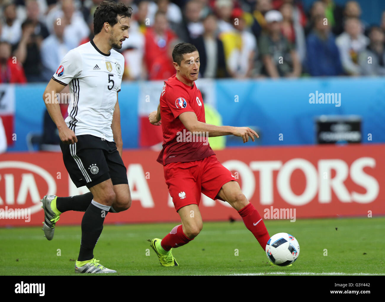 Paris, France. 16th June, 2016. Robert Lewandowski(R)of Poland competes ...