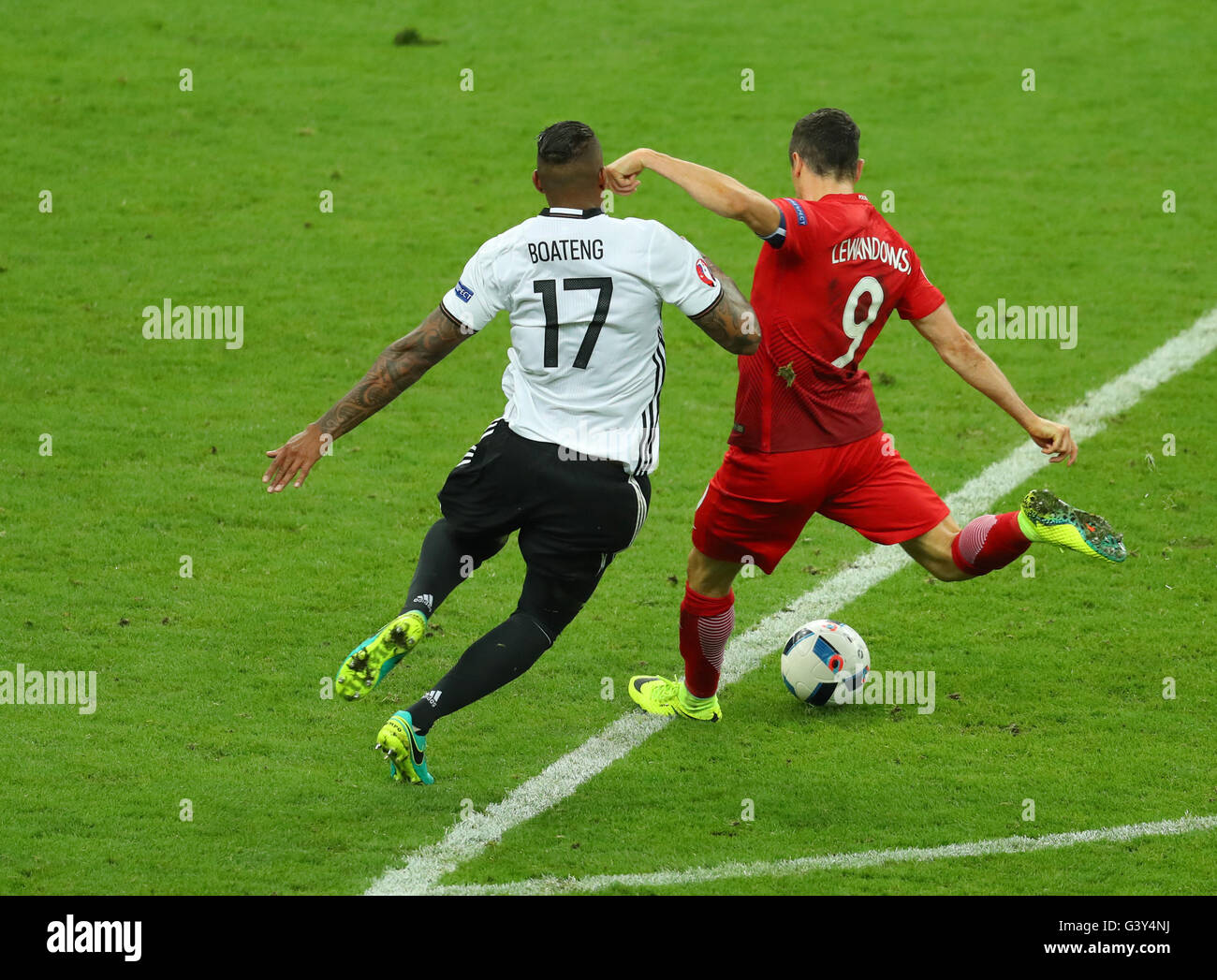 Saint-Denis, France. 16th June, 2016. Jerome Boateng (L) of Germany and ...