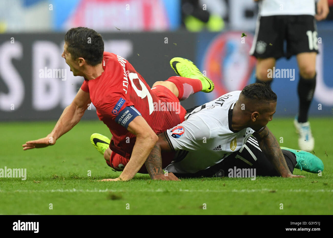 St. Denis, France. 16th June, 2016. Jerome Boateng (R) of Germany vies ...