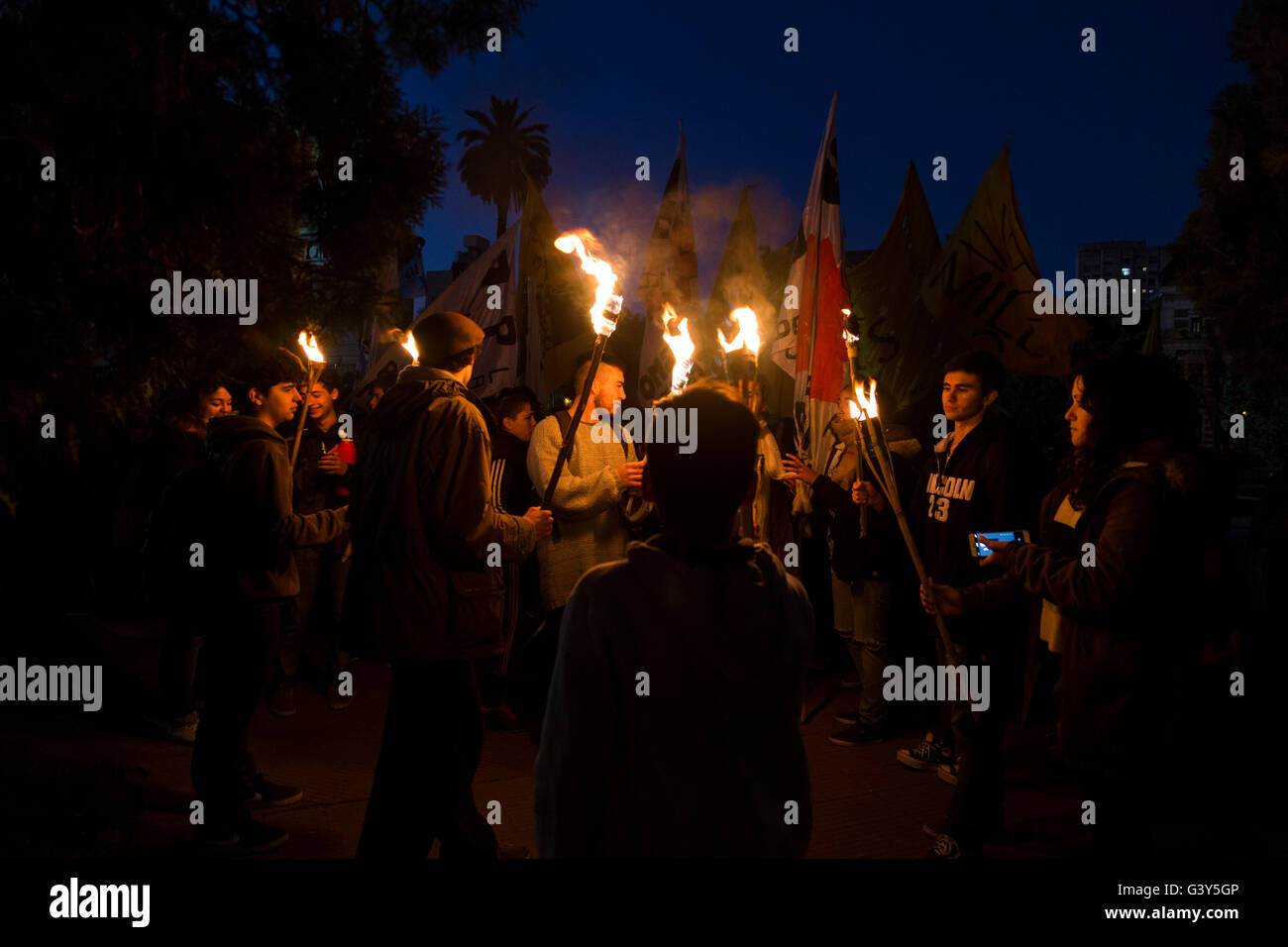 People marching with torchlights in La Plata, Argentina Stock Photo - Alamy