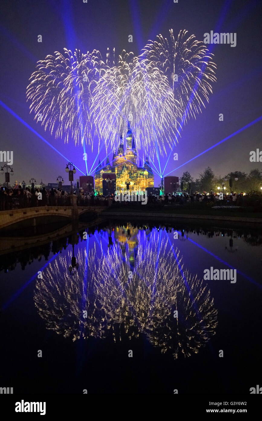 Shanghai, China. 16th June, 2016. Fireworks light up the sky during a ...