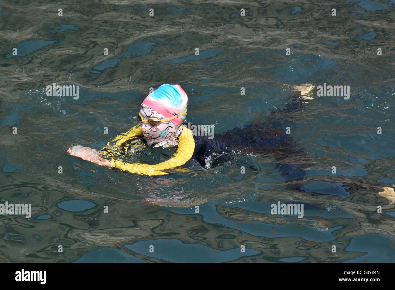 Jinan, China's Shandong Province. 17th June, 2016. A resident swims in ...