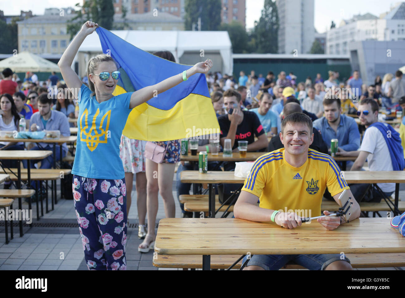 Kiev, Ukraine. 16th June, 2016. Ukrainian fans watch the UEFA EURO 2016 ...