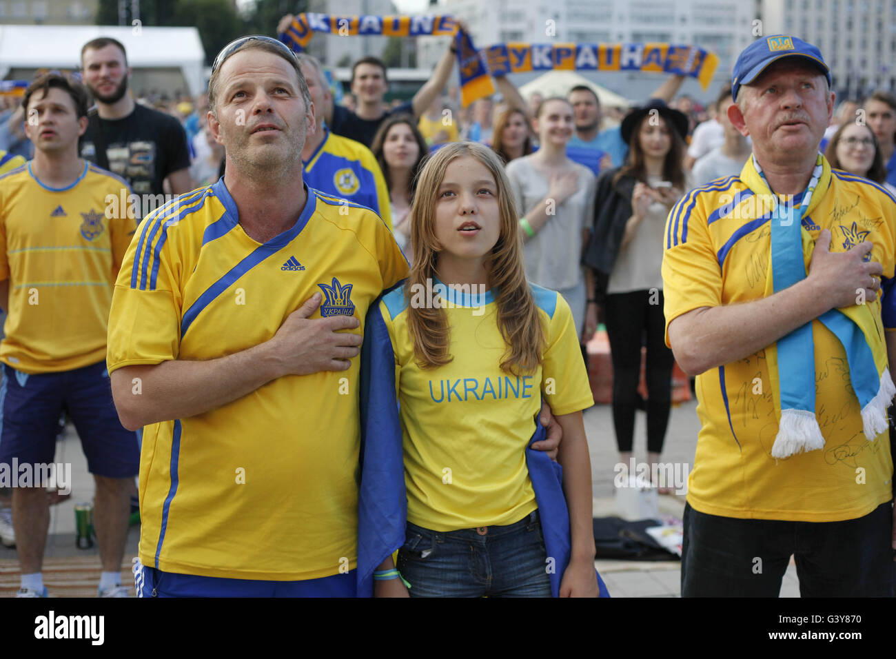 Kiev, Ukraine. 16th June, 2016. Ukrainian fans watch the UEFA EURO 2016 ...