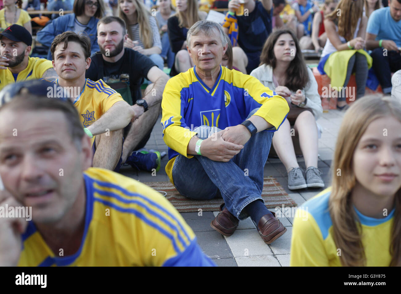 Kiev, Ukraine. 16th June, 2016. Ukrainian fans watch the UEFA EURO 2016 ...