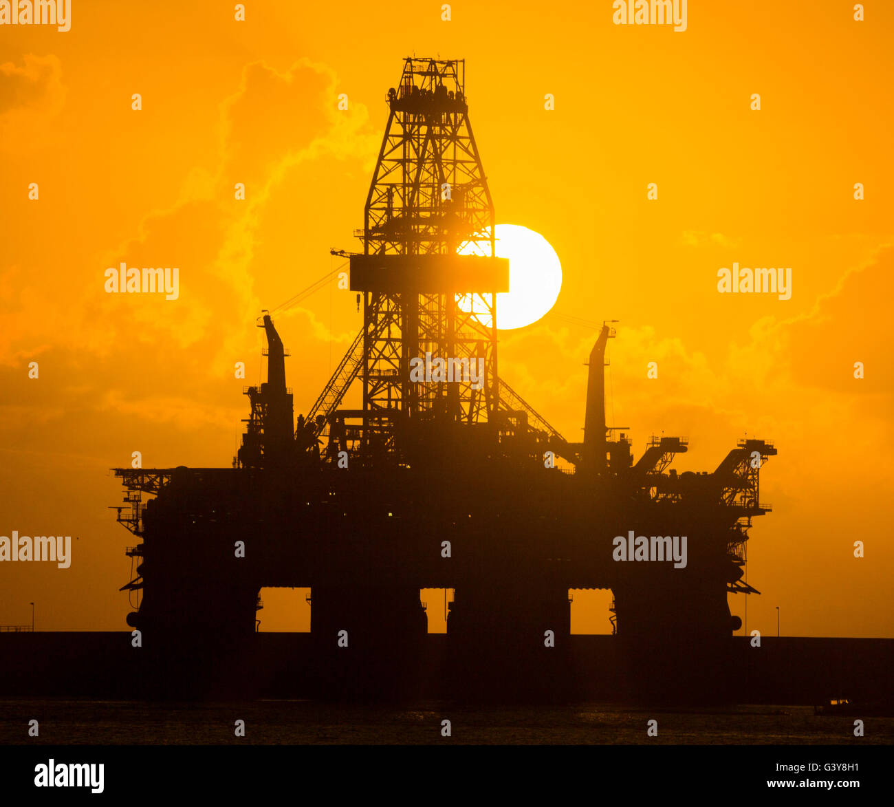 Offshore Oil rig at sunrise Stock Photo - Alamy