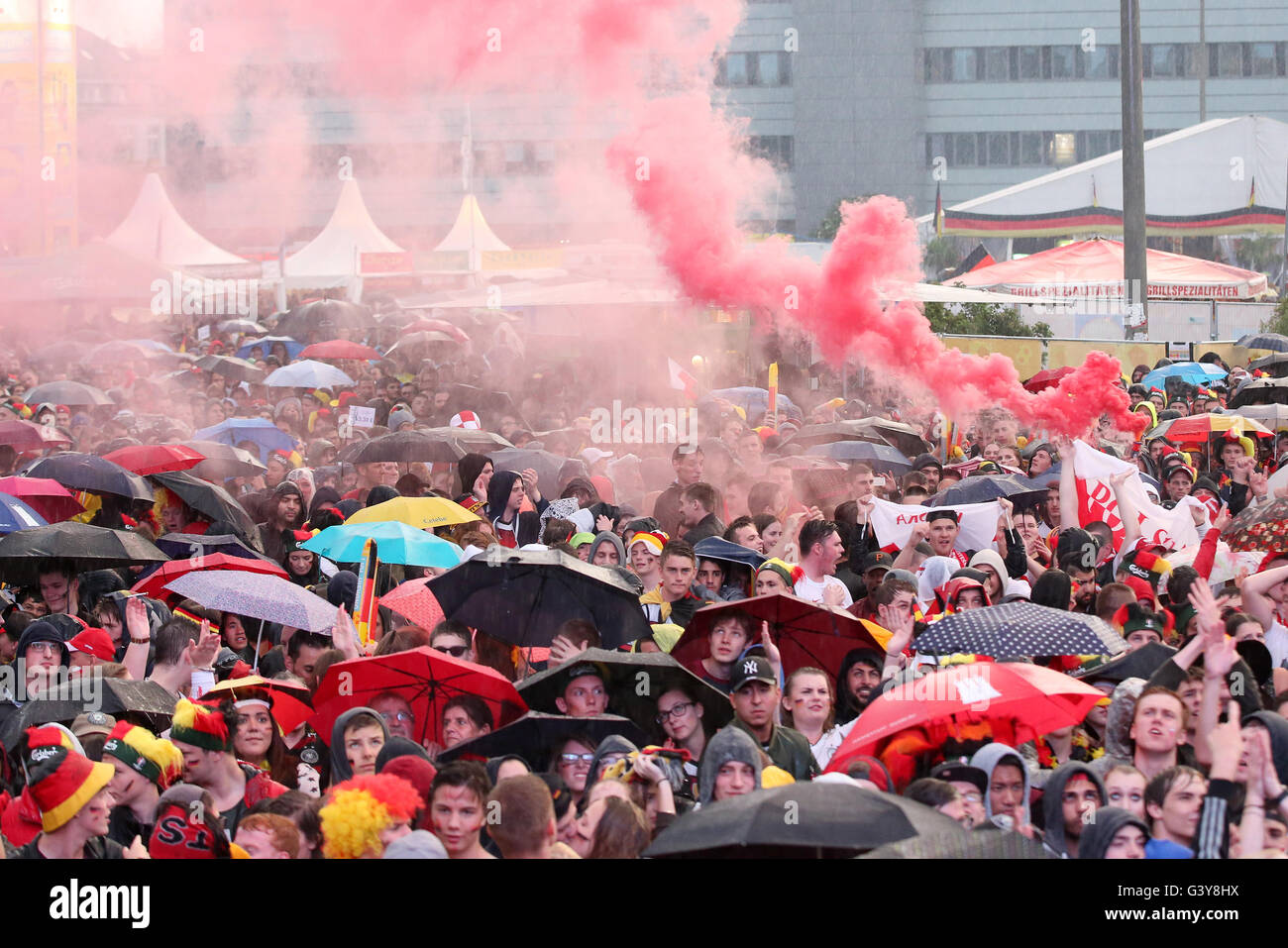 Hamburg, Germany. 16th June, 2016. Red smoke can be seen during the ...