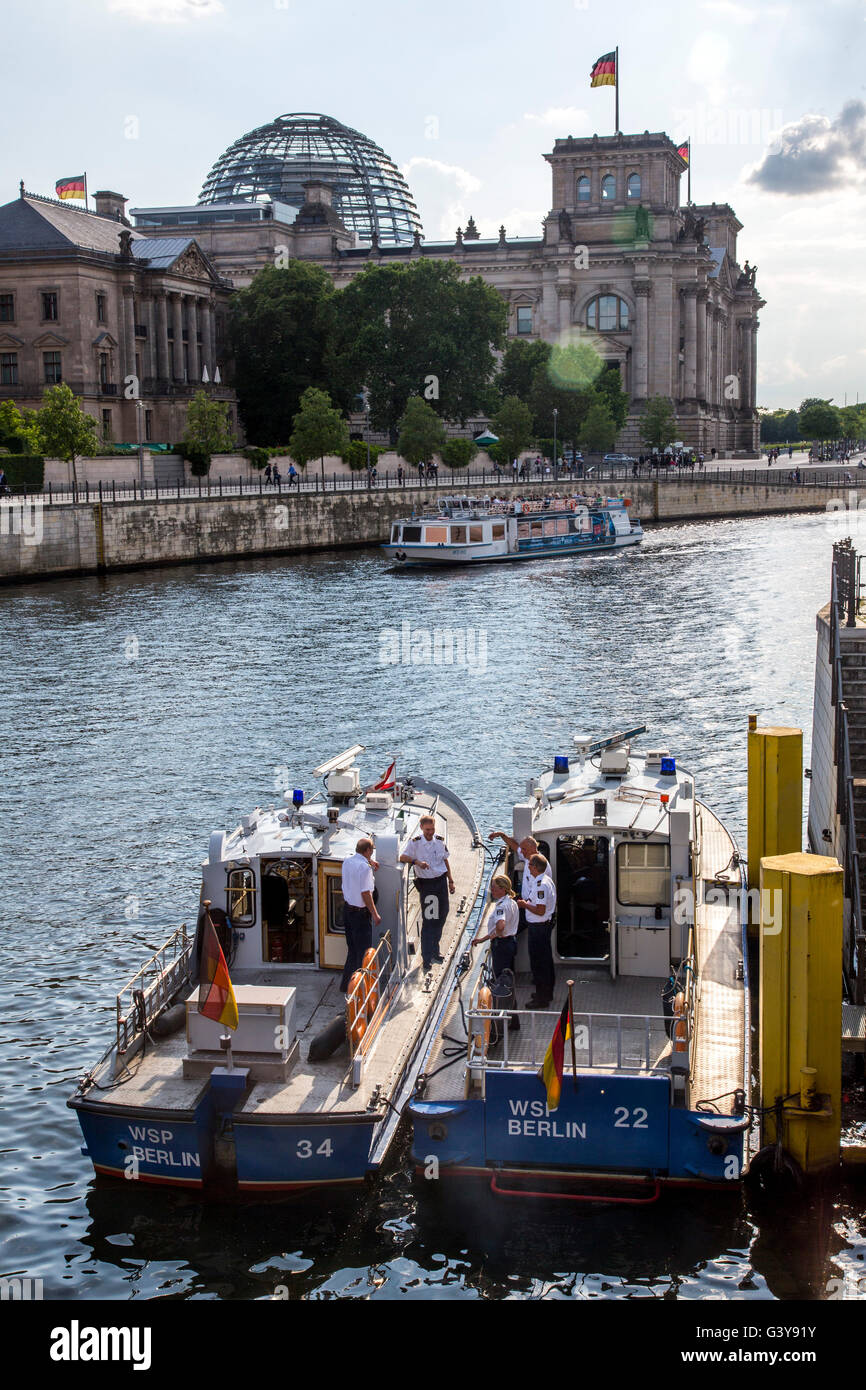 Police patrol boats, sightseeing boat, on river Spree, German ...