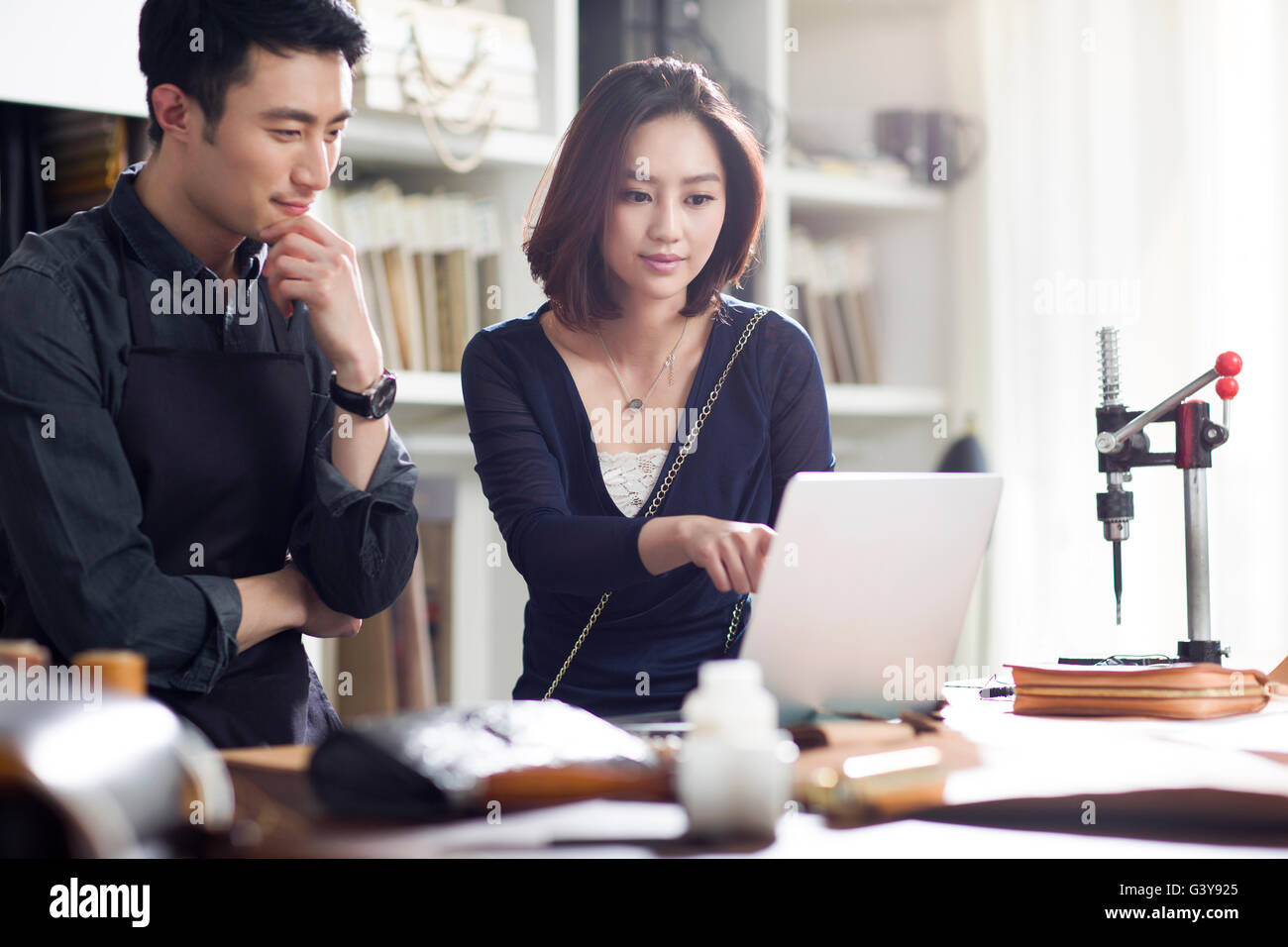 Cheerful craftsman using laptop in hi-res stock photography and images ...