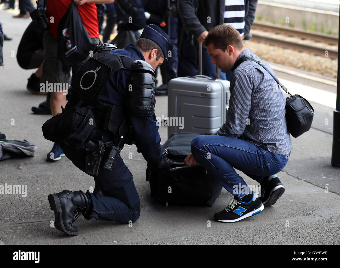 Police search bags at Lens railway station before the UEFA Euro 2016 ...