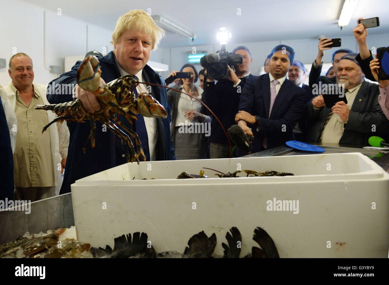 He visits sam cole foods fish processing factory hi-res stock ...