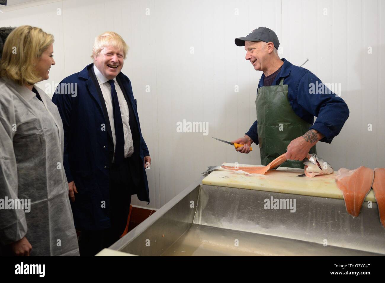Boris Johnson MP chats with Basil Burgess (right) as he visits Sam Cole ...