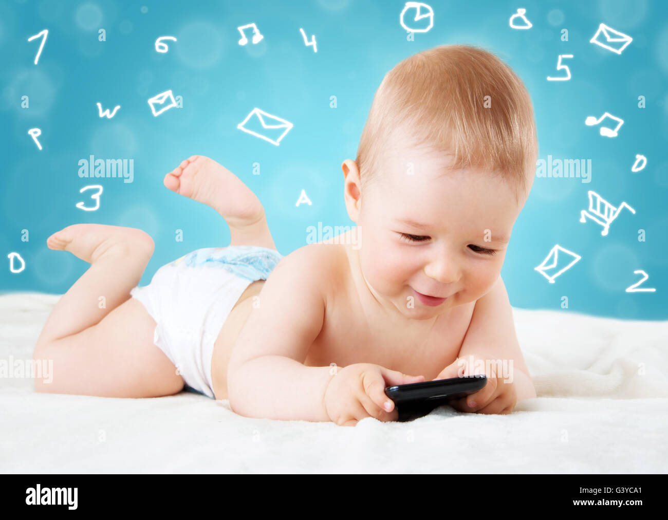 Baby holding a phone Stock Photo - Alamy