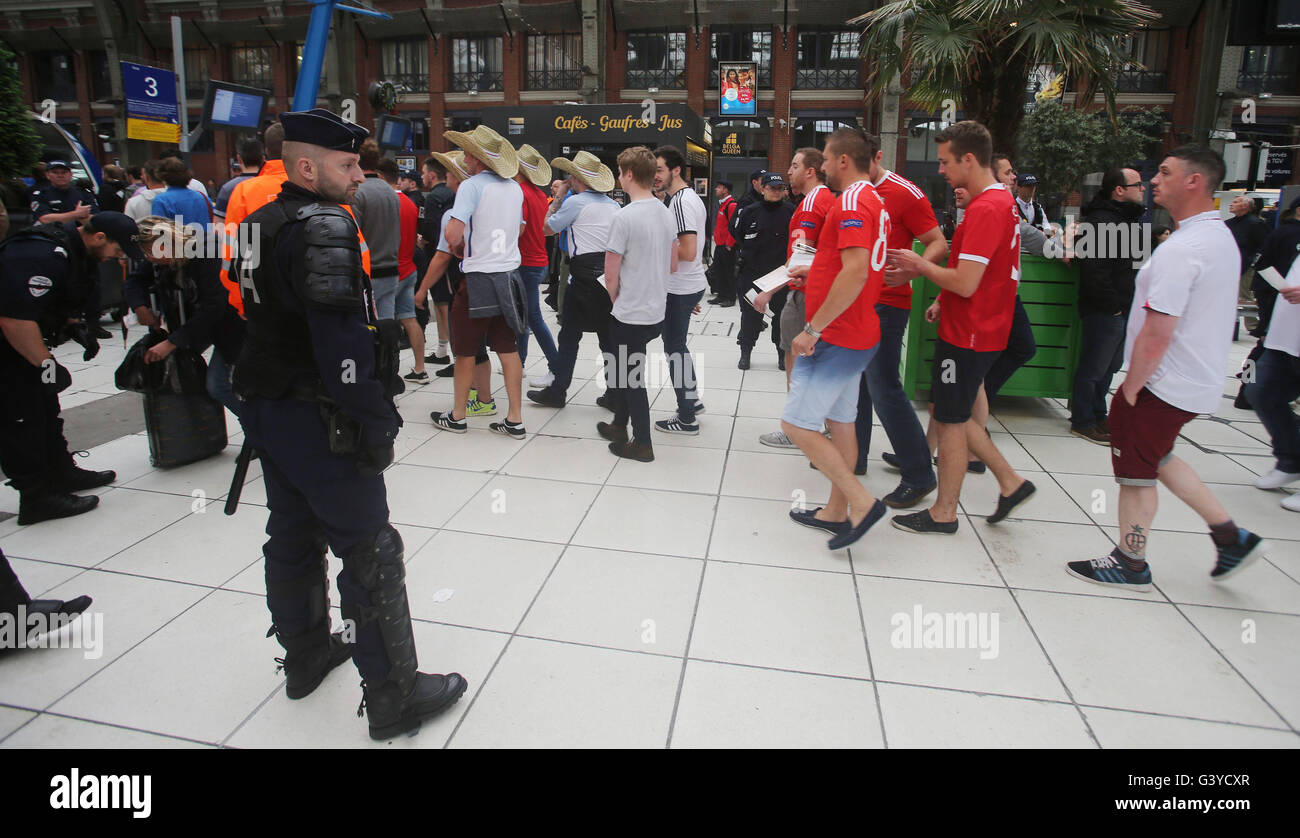 football fans at Lille train station in France, as they board trains to ...