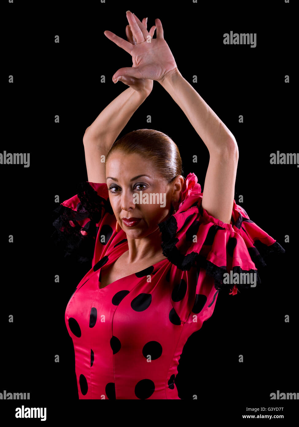 Woman dancing flamenco, looking at the camera Stock Photo - Alamy