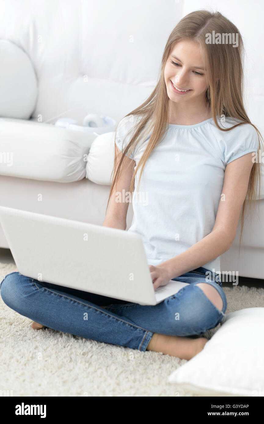 happy girl using laptop Stock Photo - Alamy