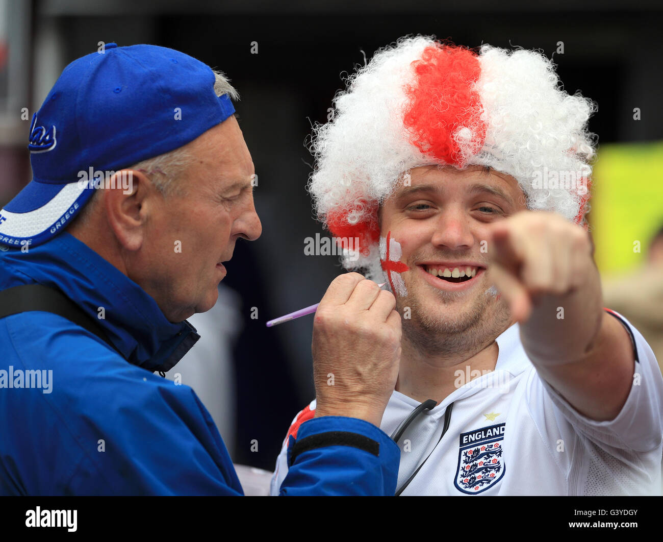 An England fan has his face painted during the UEFA Euro 2016, Group B ...