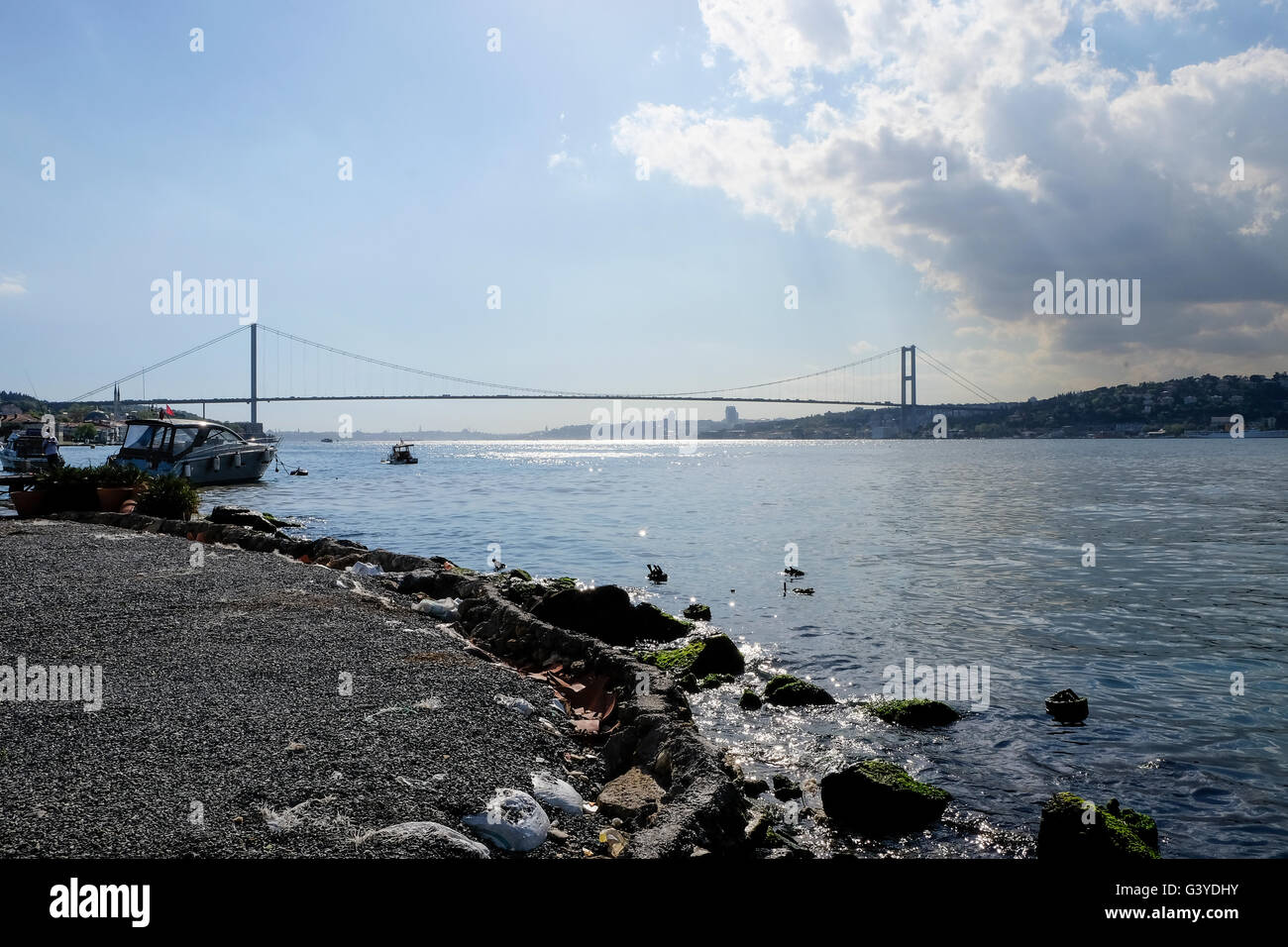 Bosphorus waterway, Istanbul, with bridge in the distance and fishing ...
