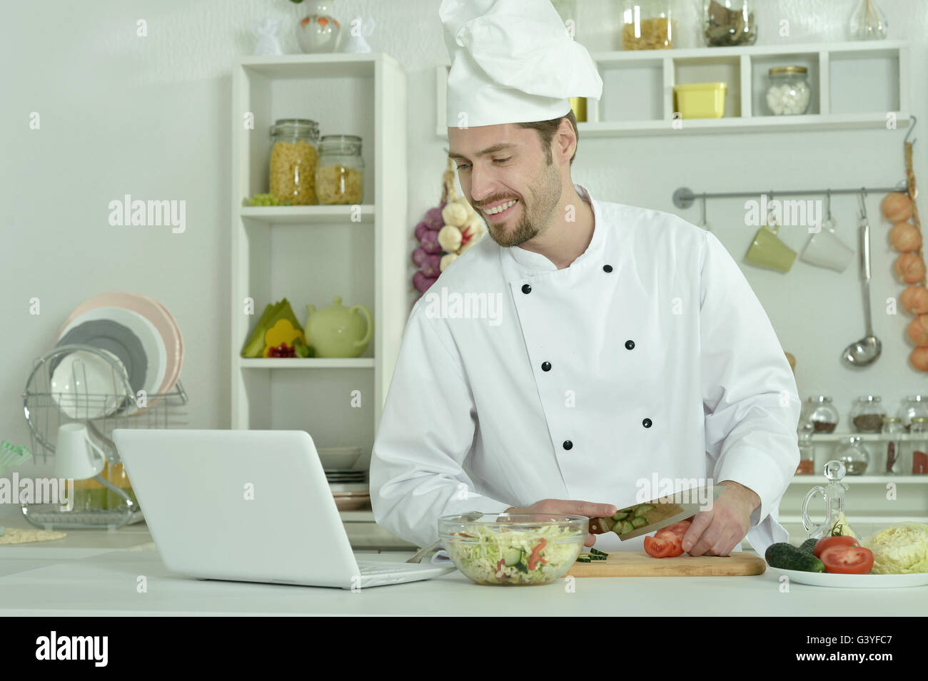 Man cooking in kitchen Stock Photo - Alamy