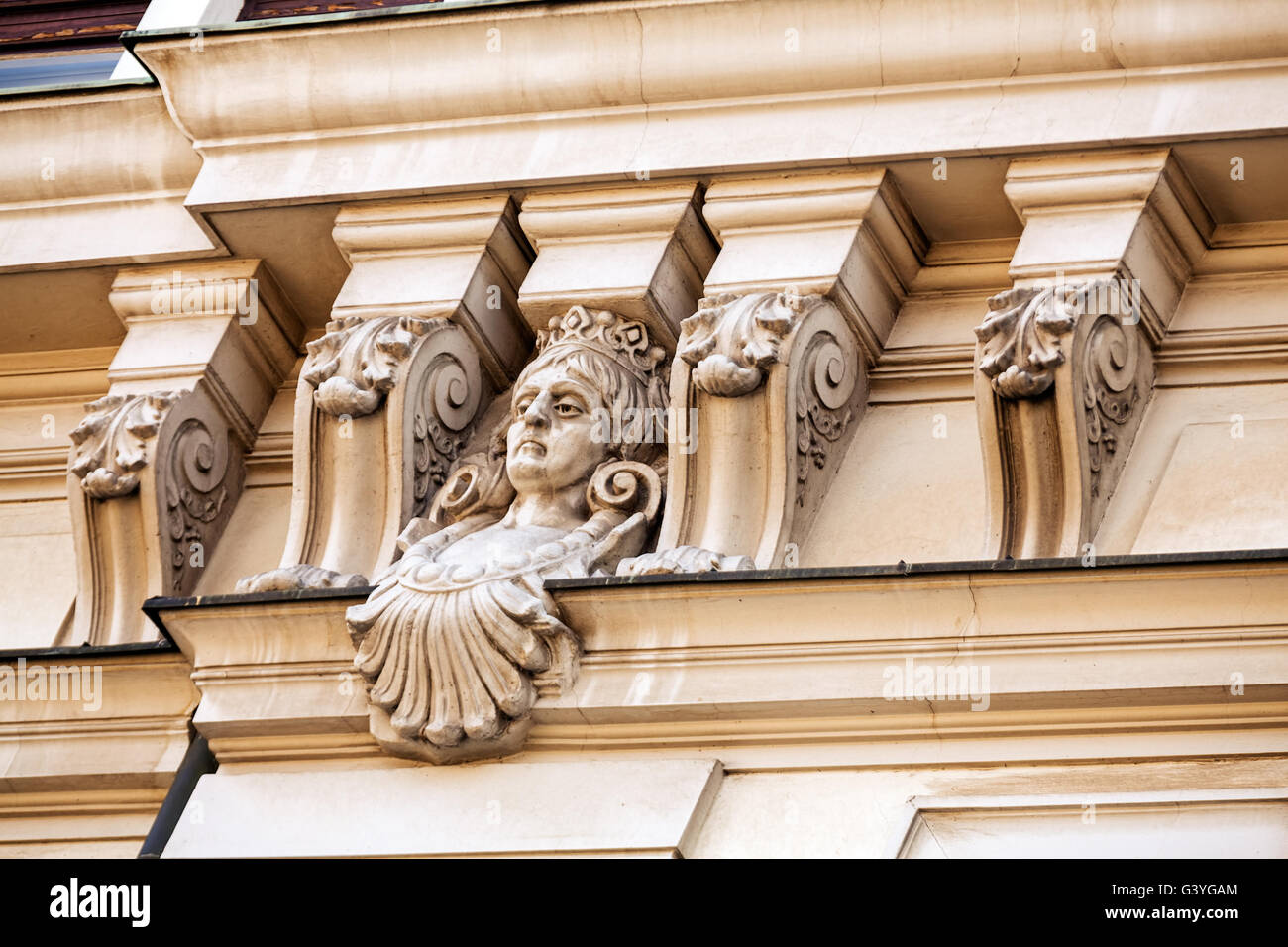 stone facade on classical building with ornaments and sculptures Stock ...