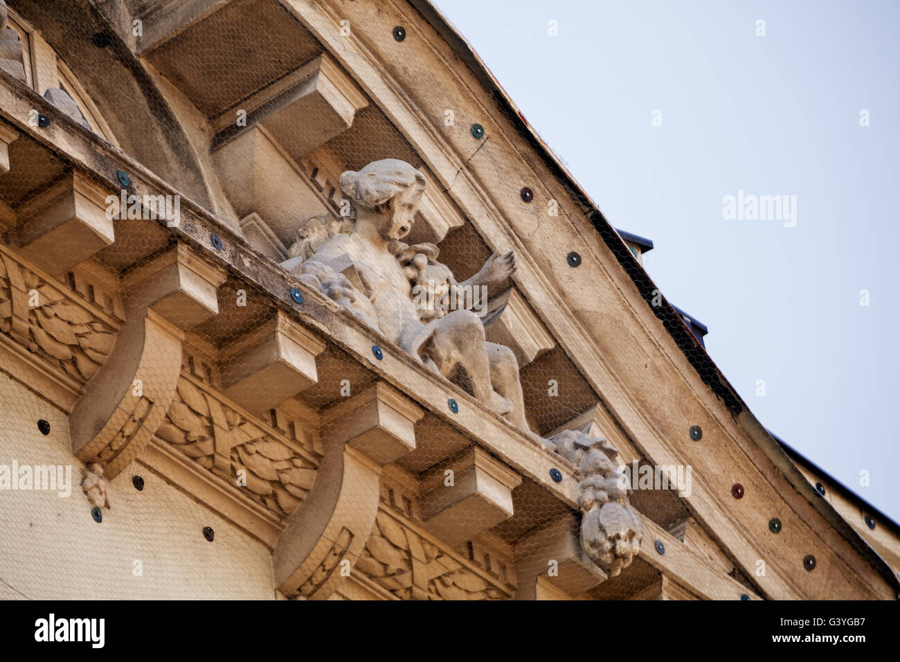 stone facade on classical building with ornaments and sculptures Stock ...