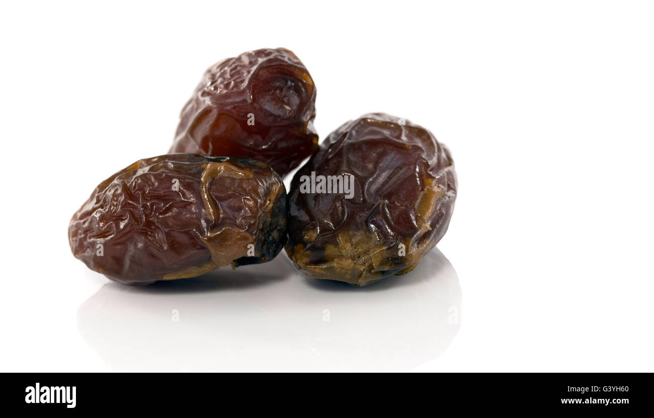 three fresh best quality dates isolated on white background Stock Photo ...