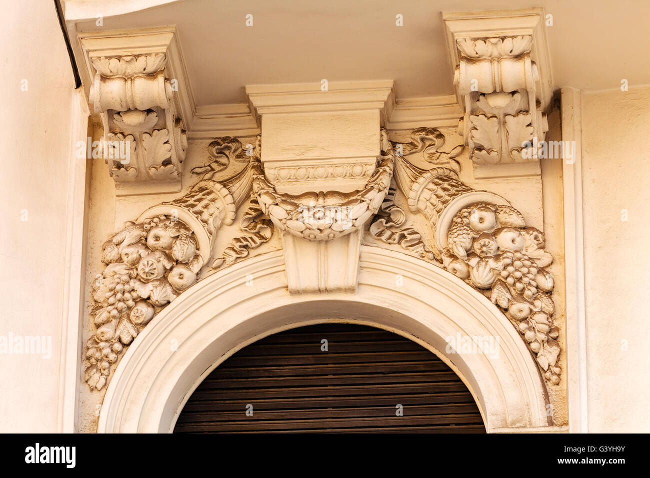 stone facade on classical building with ornaments and sculptures Stock ...