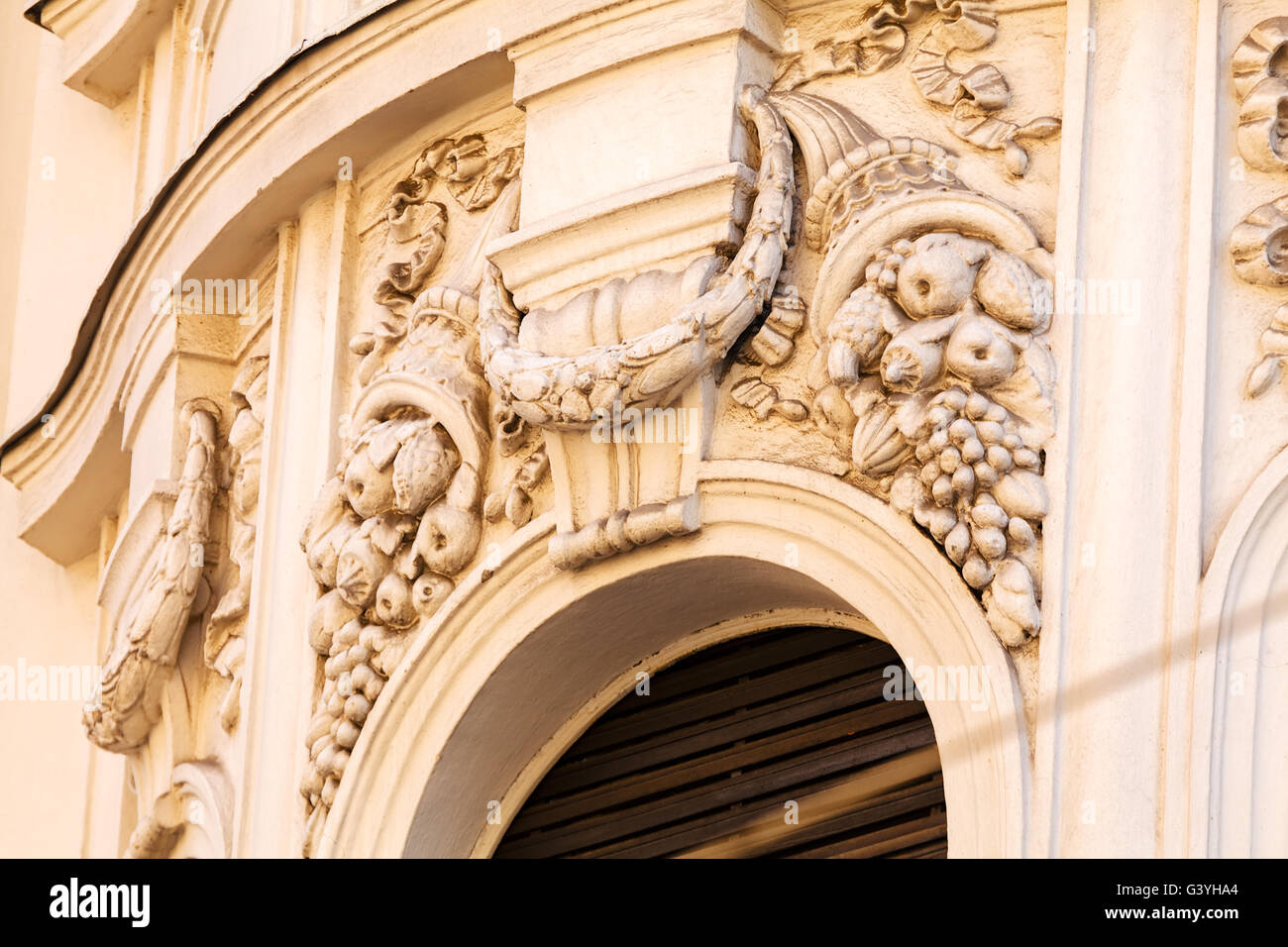 stone facade on classical building with ornaments and sculptures Stock ...